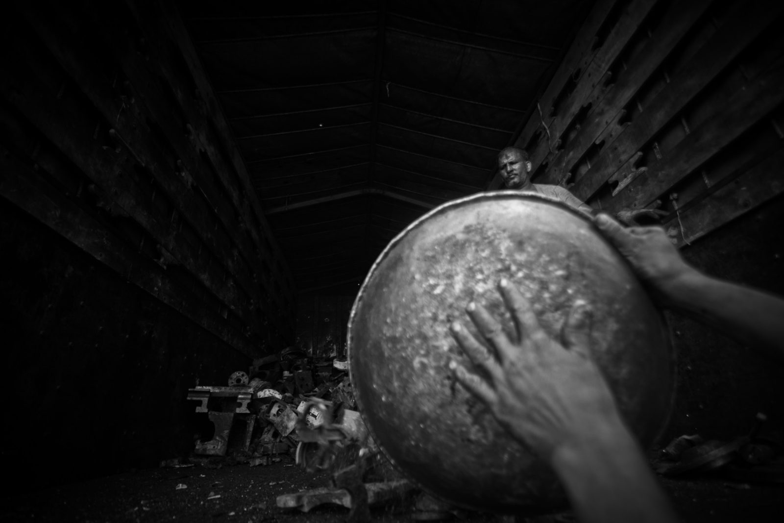 Workers loading the truck with heavy iron materials, Dharukhana, Reay ...